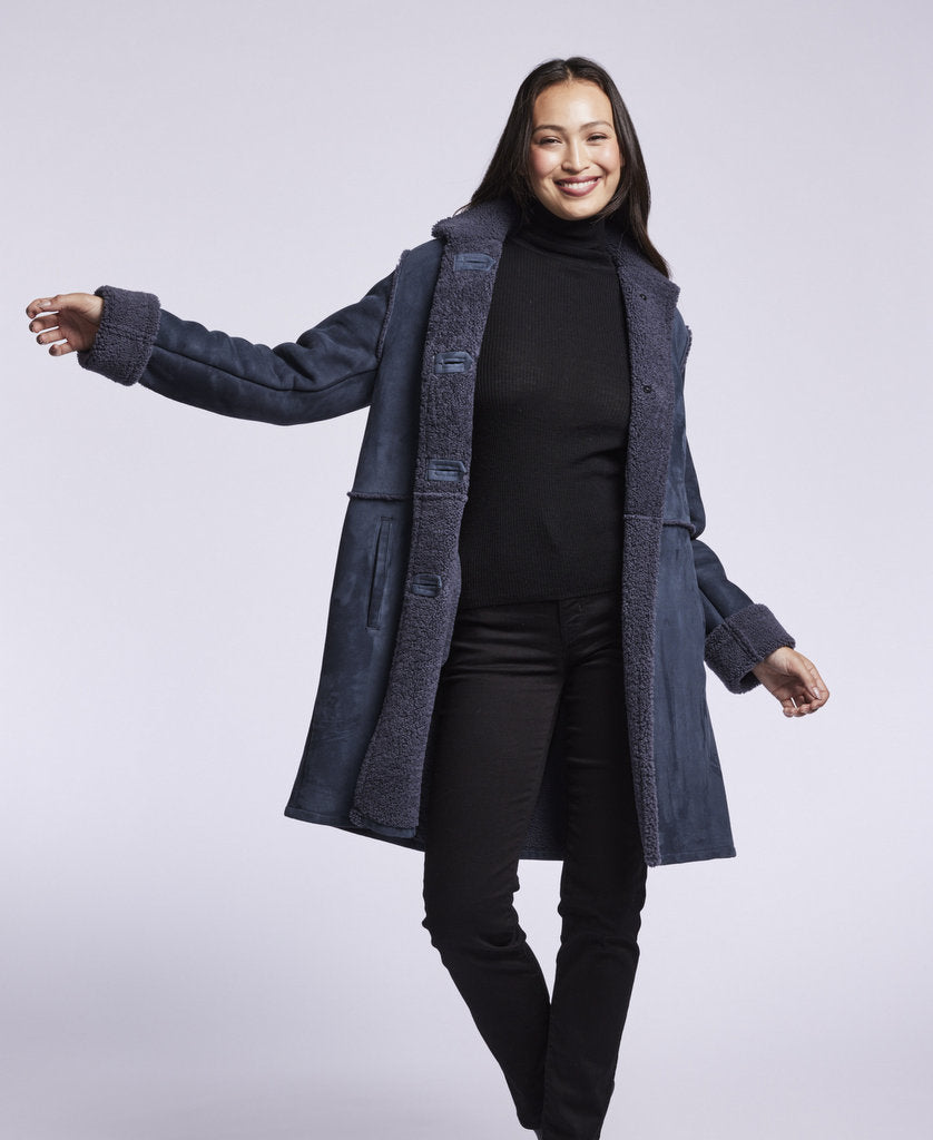 3291 Exposed seams shearling coat